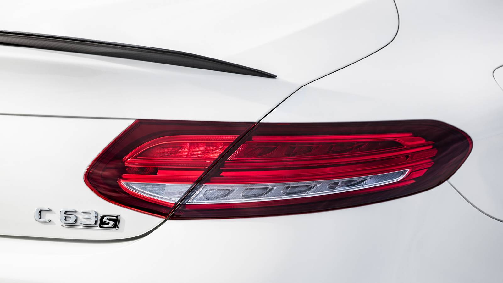 Mercedes-AMG C63 vs Ford Mustang GT: V8 Coupe Showdown on a Budget