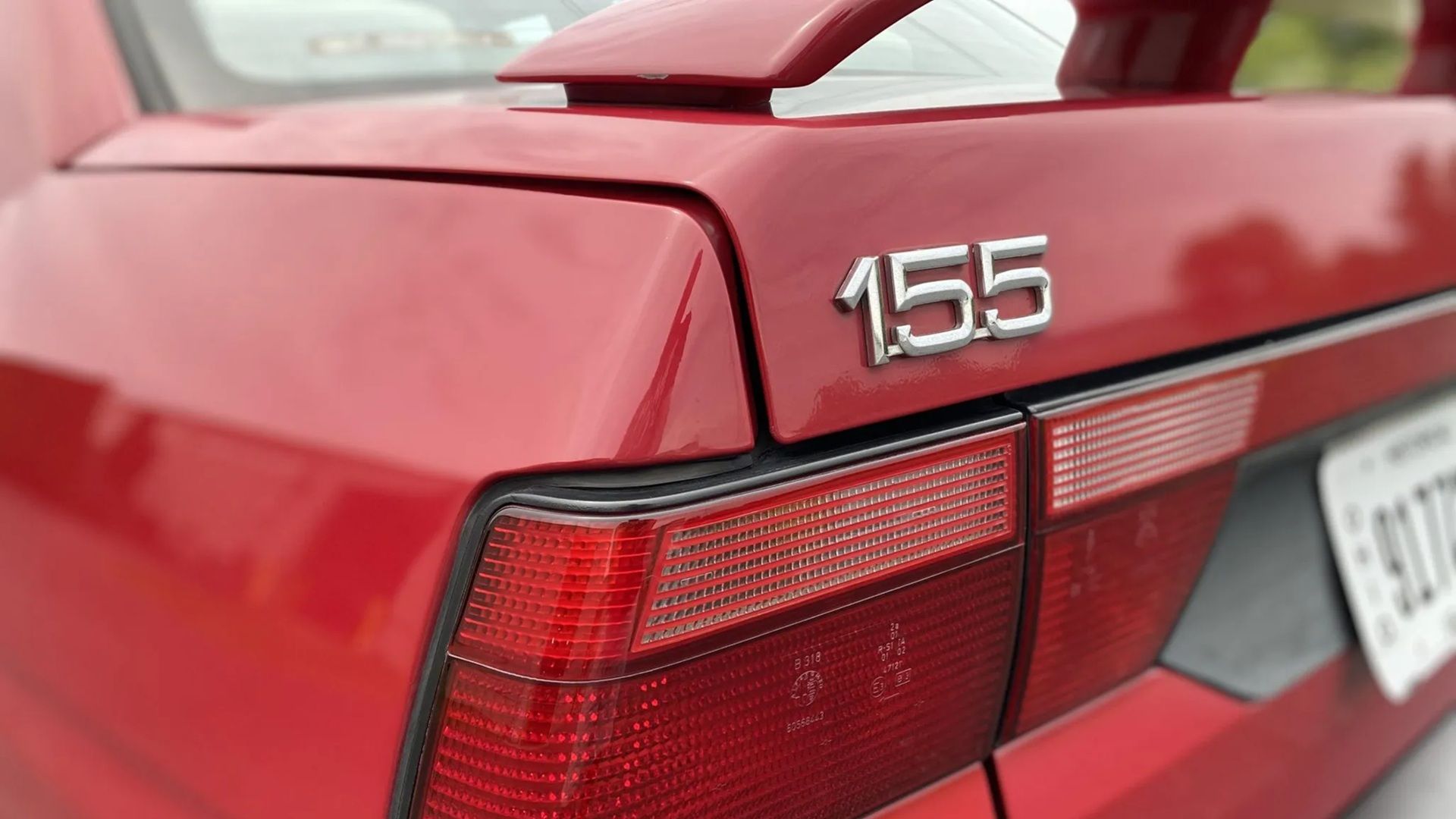 The 1990s Alfa Romeo Sports Sedan Came With Aerodynamic Parts In The Trunk