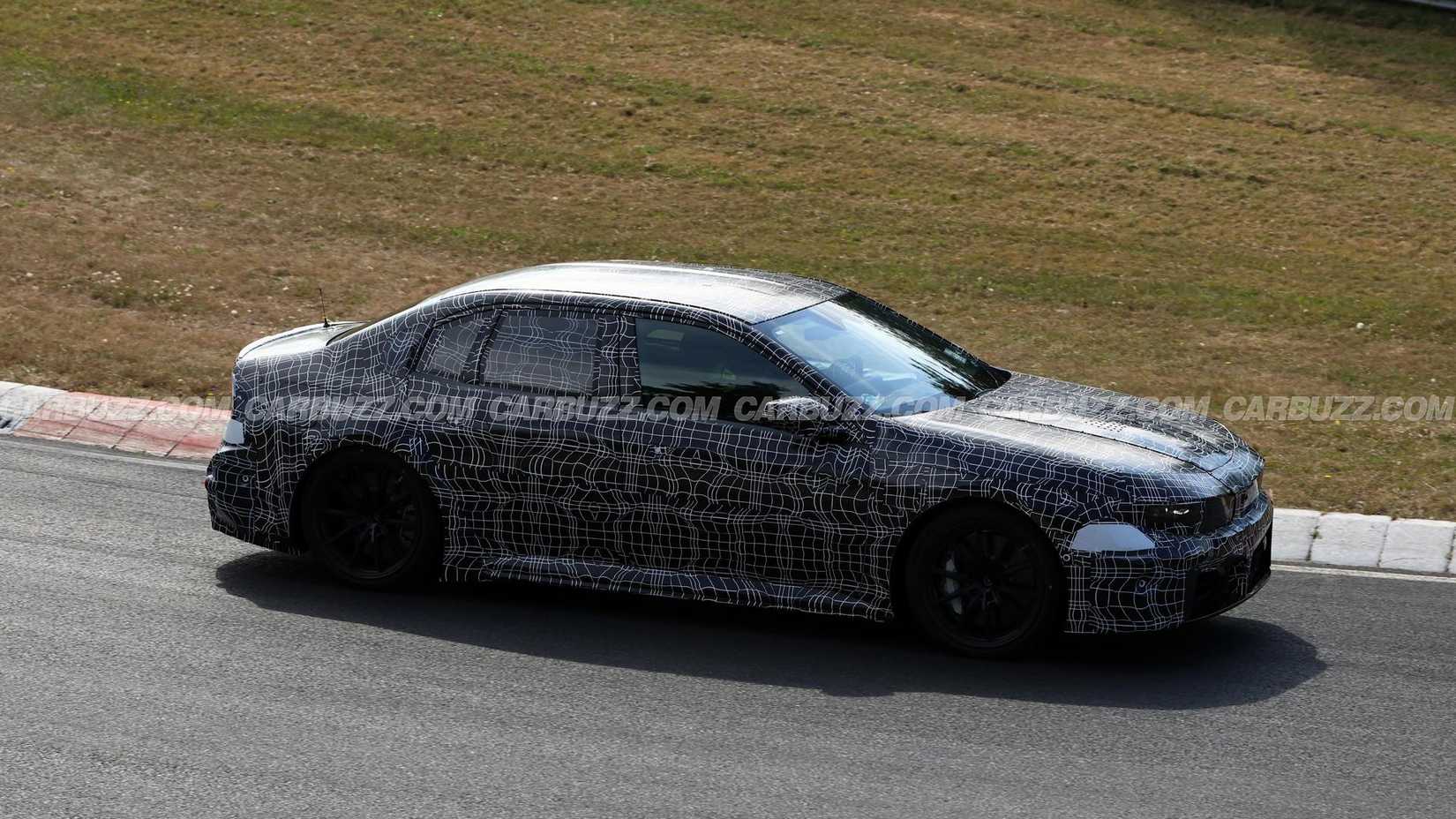 Next-Generation BMW M3 EV Spied Testing Hard At The Nurburgring