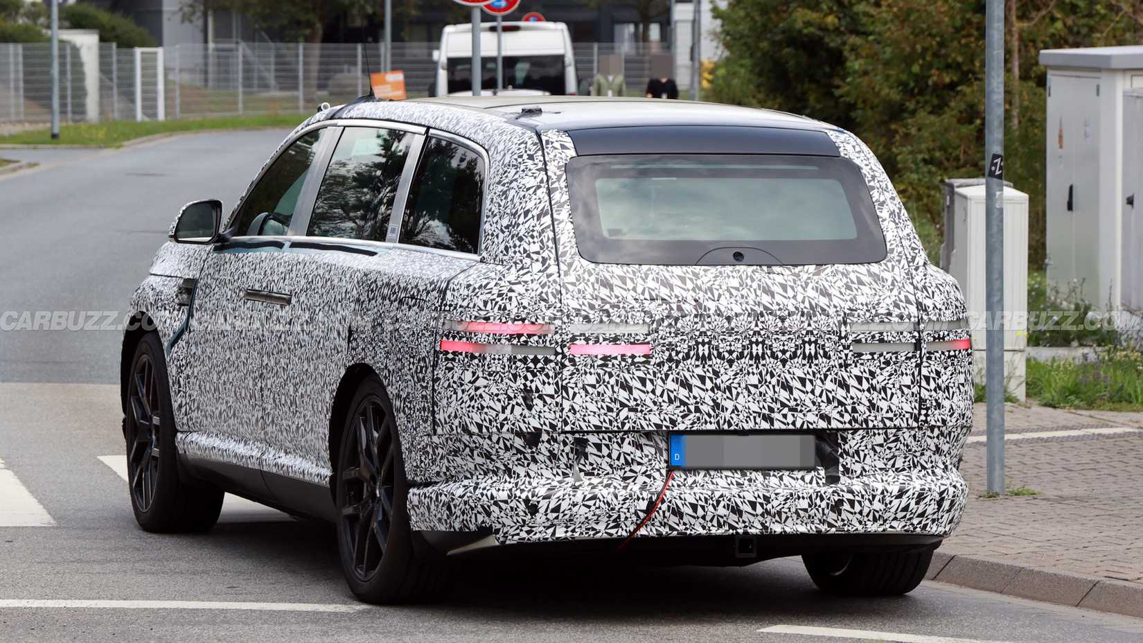 Genesis GV90 Drops Camo, Shows Swanky Doors In New Spy Shots