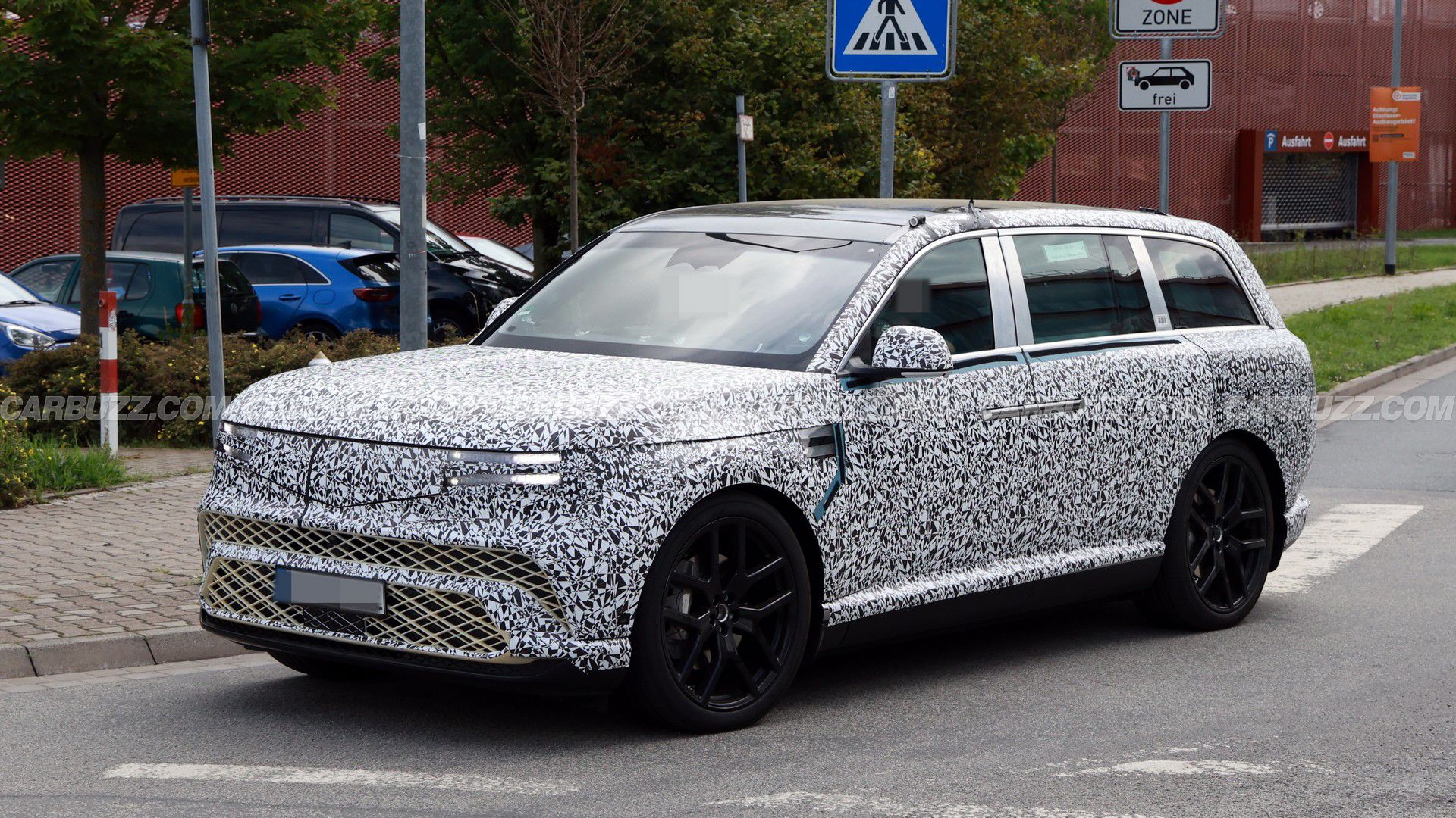 Genesis GV90 Drops Camo, Shows Swanky Doors In New Spy Shots