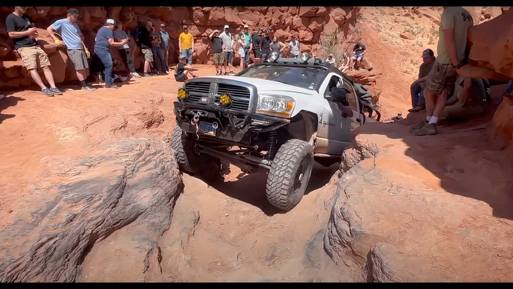 Watch A Big Ram Diesel Cummins Perilously Rock Crawling At Moab