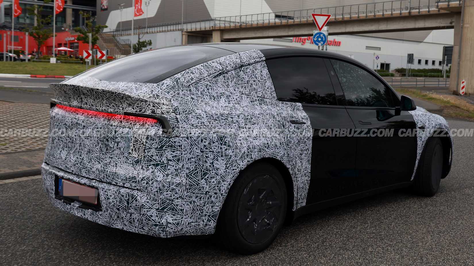 Tesla Model Y Long Wheelbase Spied Testing Near Germany's Famed Race Track