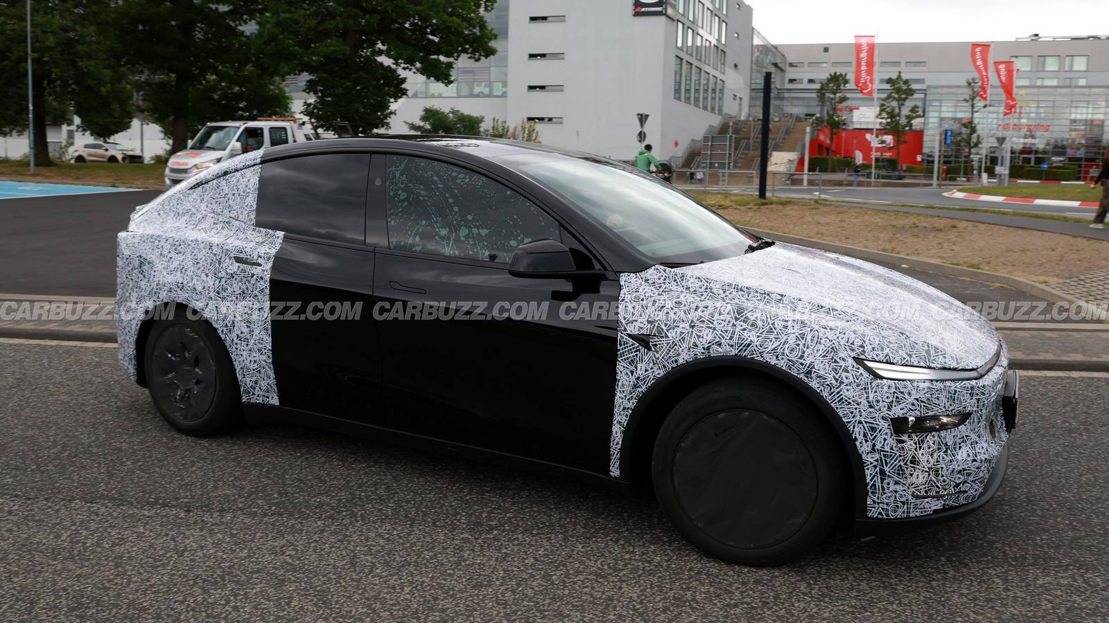 Tesla Model Y Long Wheelbase Spied Testing Near Germany's Famed Race Track