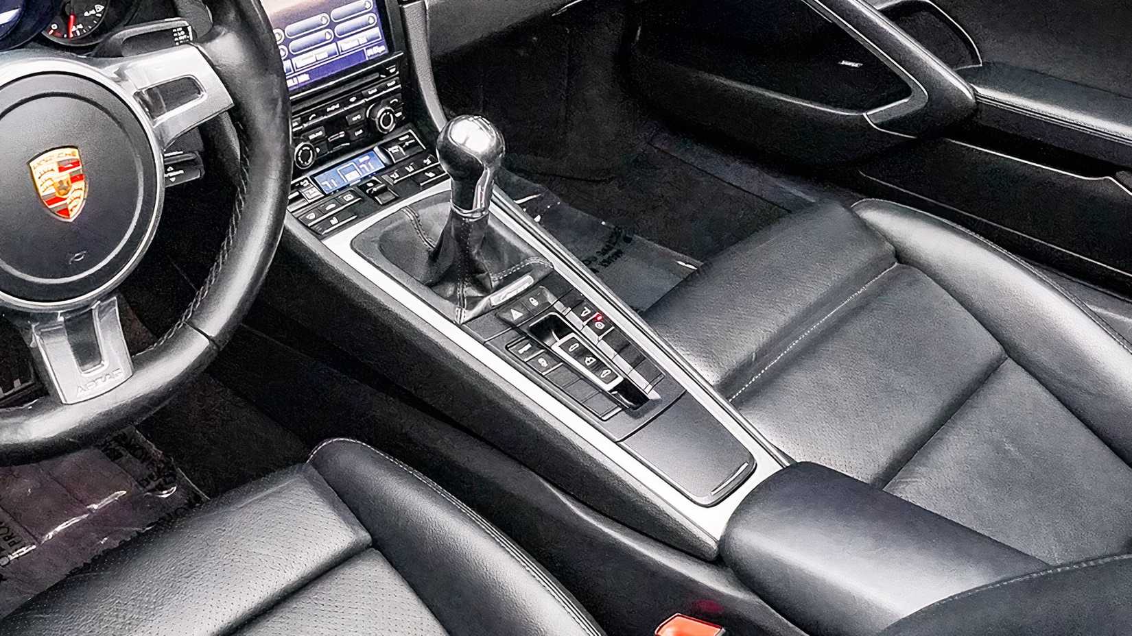 Tesla's Cheaper Model Y Hides Panoramic Roof Behind A Plain Headliner