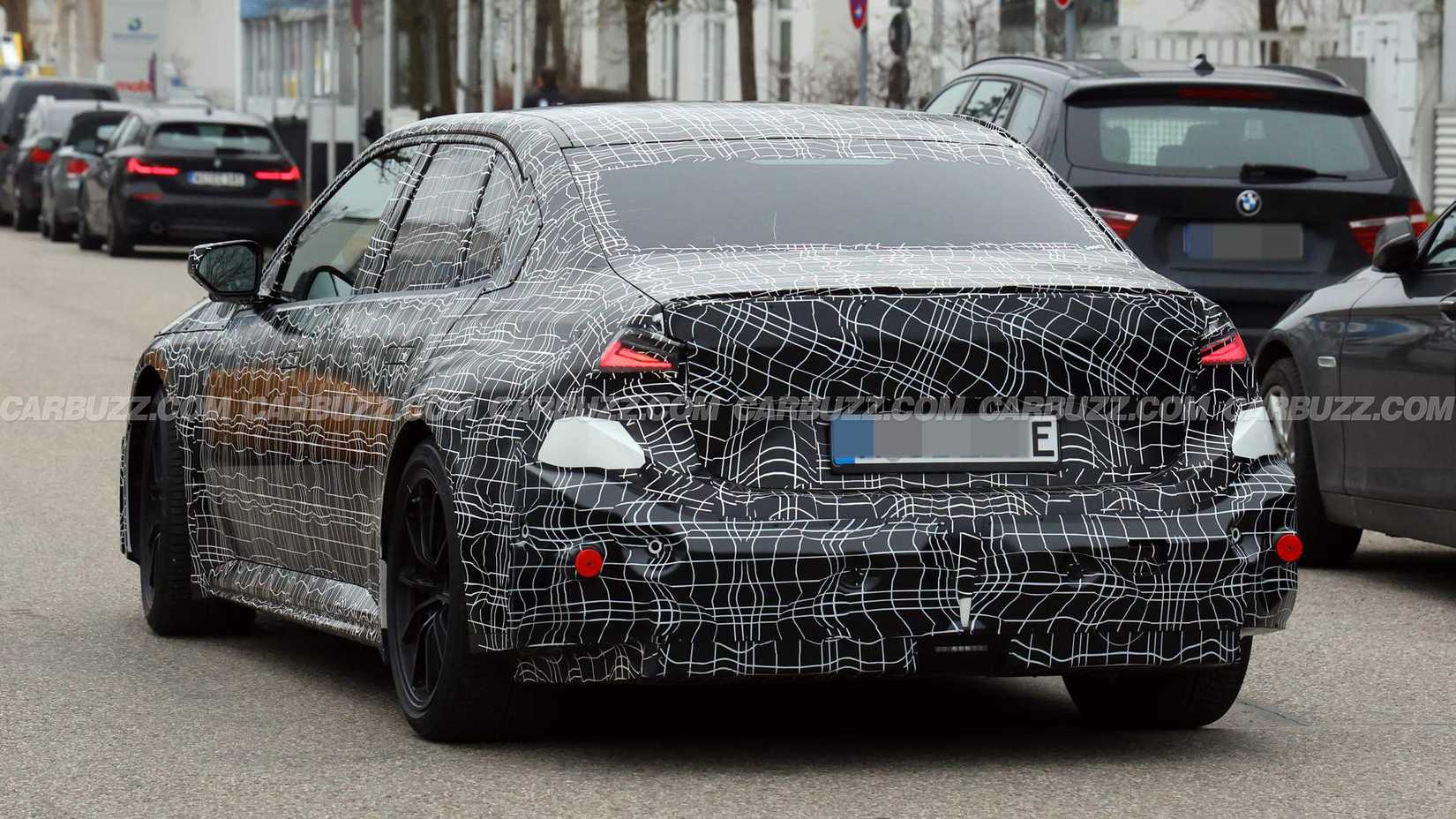 New BMW M3 EV Spied With Production Headlights For The First Time