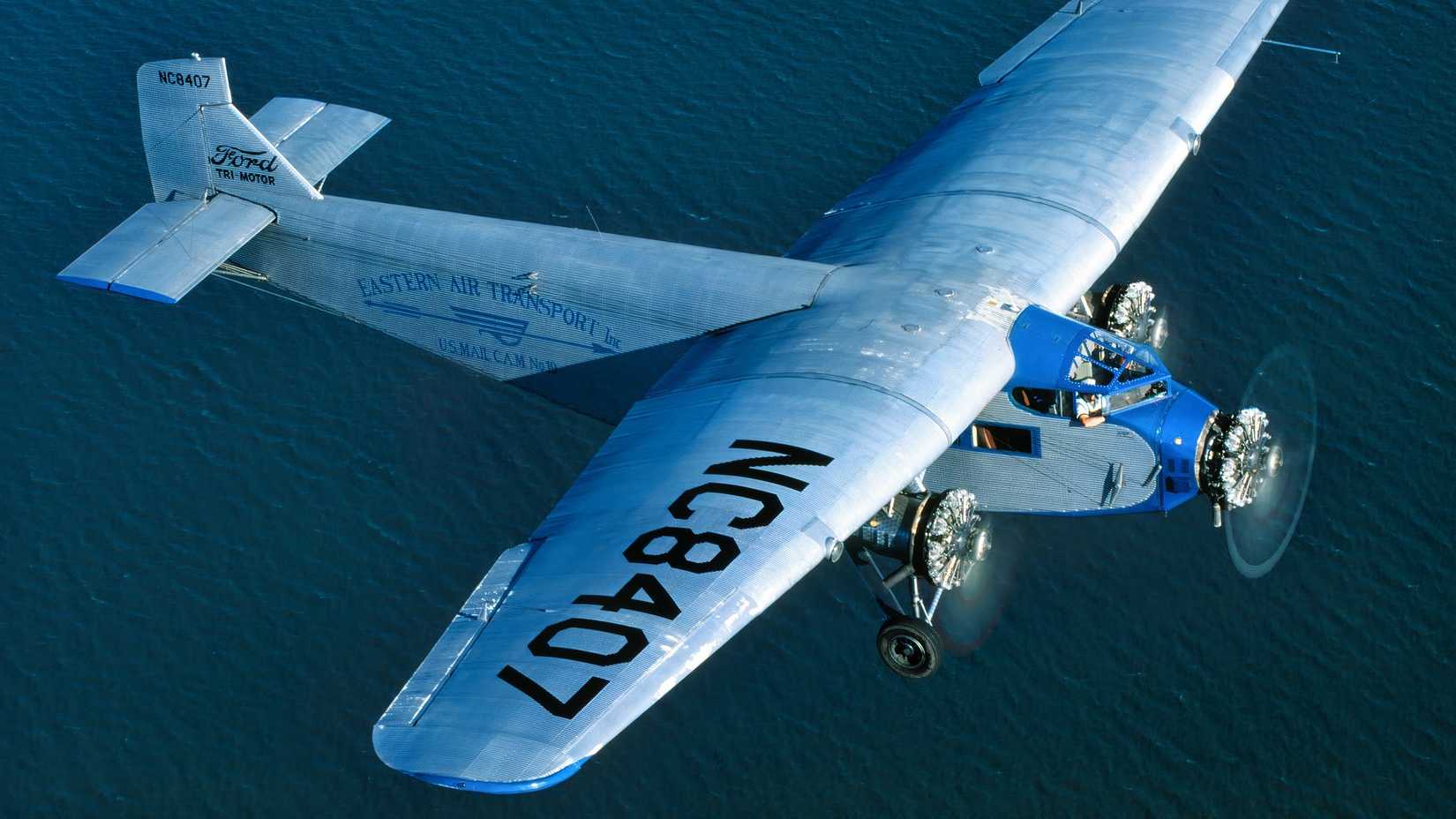 1920s Ford Dominated Land With The Model T And Sky With The Tri-Motor