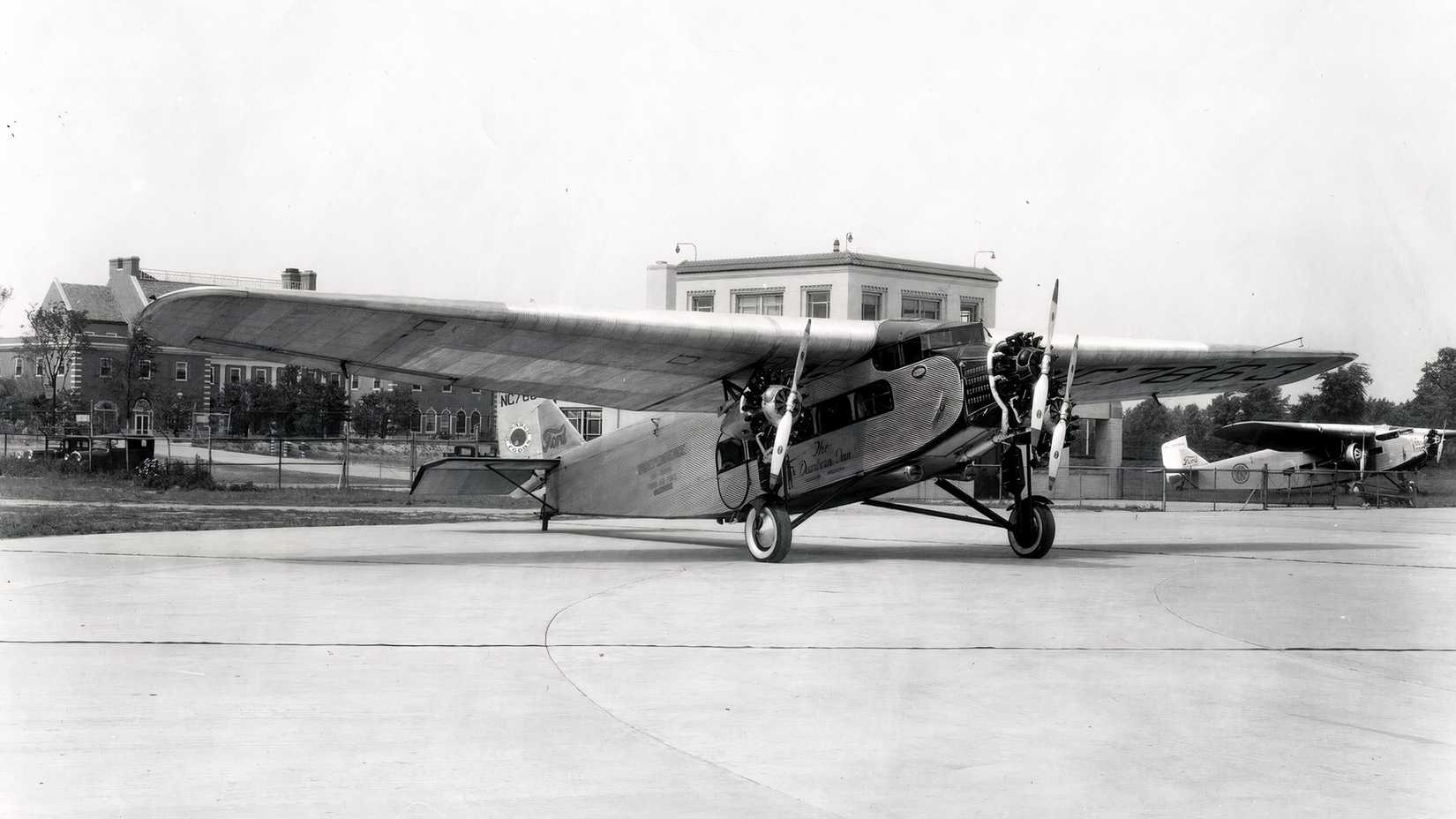 1920s Ford Dominated Land With The Model T And Sky With The Tri-Motor