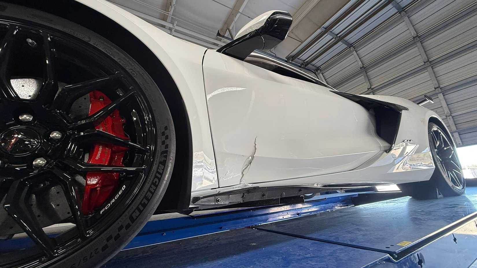 A C8 Corvette Fell Off A Dealership Lift, And It Won't Be The Last