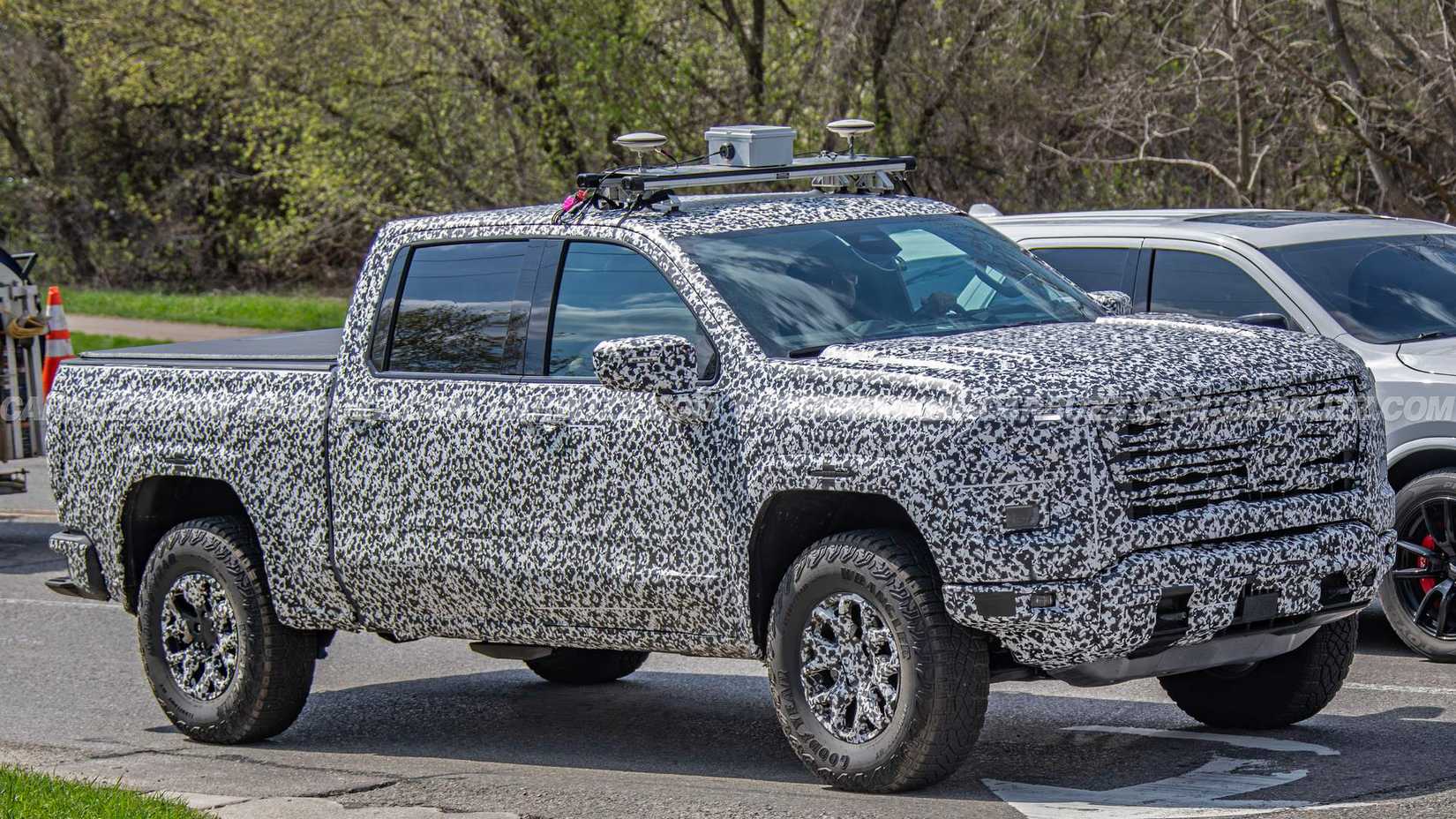 The Next Hardcore GMC Sierra AT4X Drops Camo In New Spy Shots