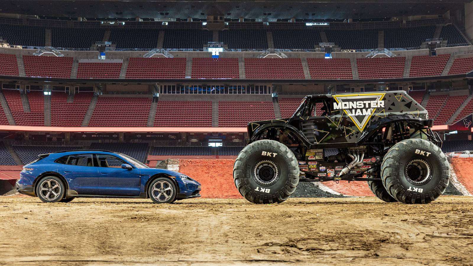 Watch A Porsche Taycan Turbo S Cross Turismo Race A Monster Jam Truck