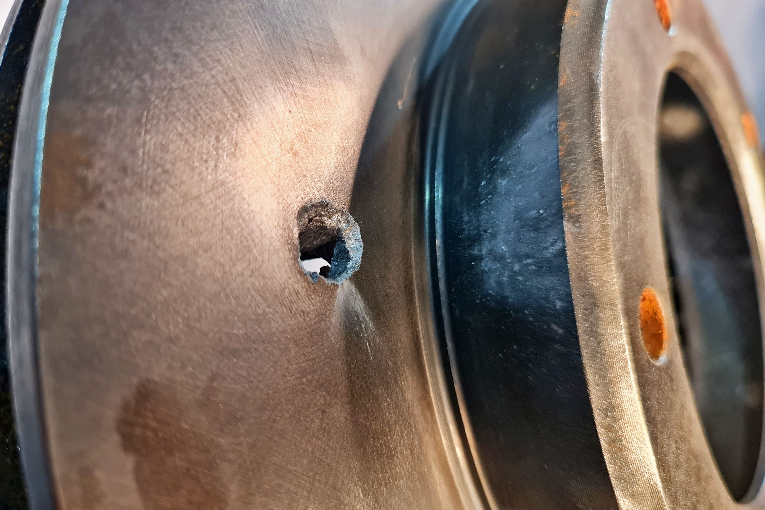 What Happens When You Shoot A Brake Rotor With An AK-47?
