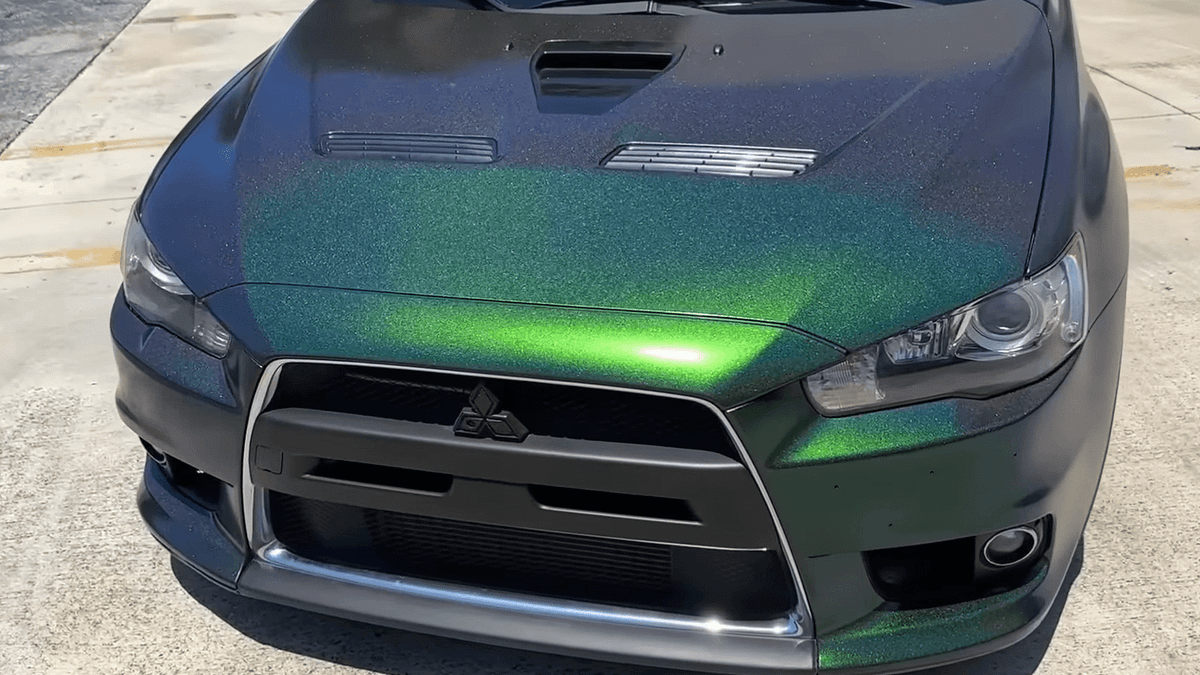 Mitsubishi Lancer Evo X Gets Insane Look With Rainbow Unicorn Chameleon ...