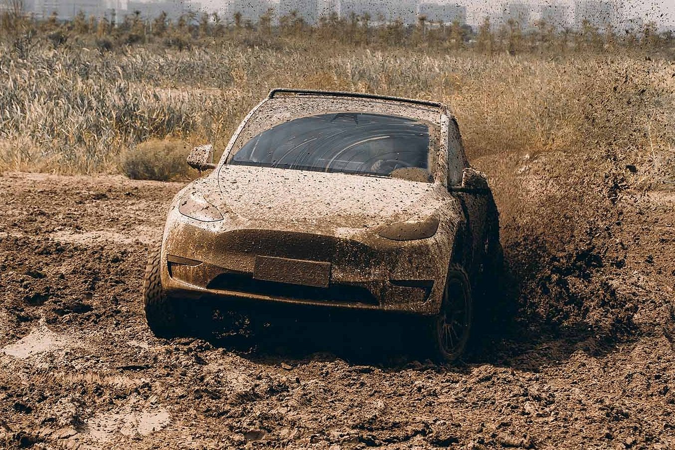 Tesla Model Y With Lift Kit Makes The Cybertruck Look Cute