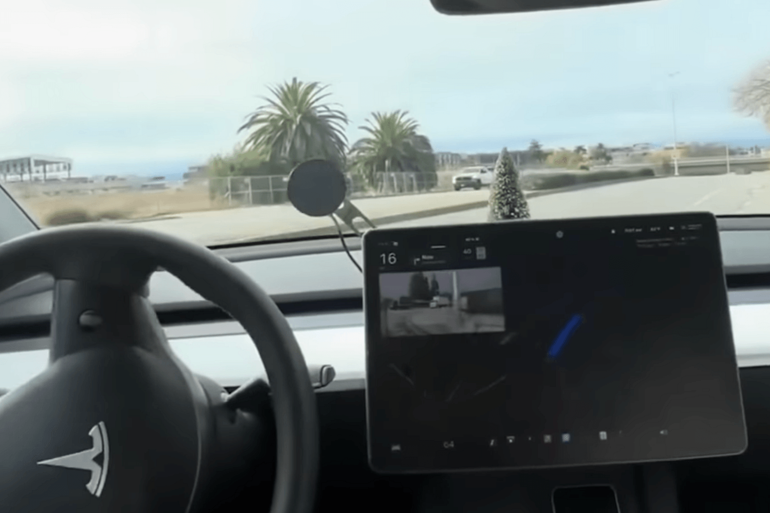 WATCH: First Look At Tesla's Latest Full Self-Driving System