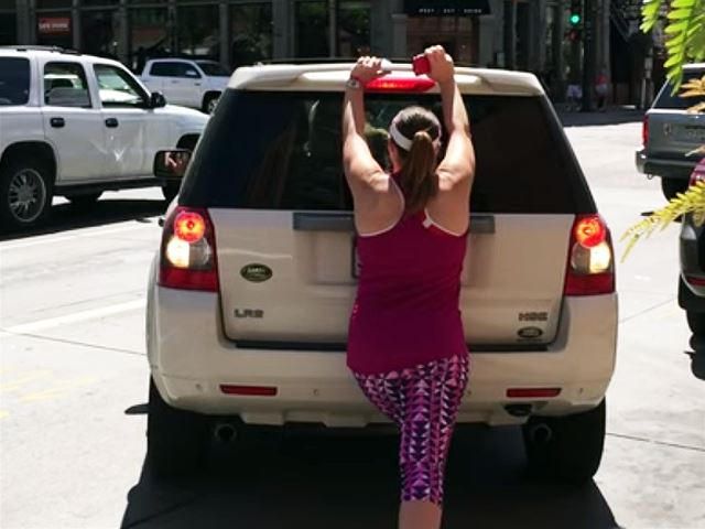 Insane Woman Blocks A Parking Spot With Her Body