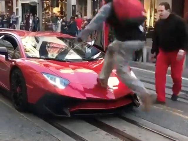 Man Jumps On Lamborghini Aventador SV, Owner Serves Fist To His Face
