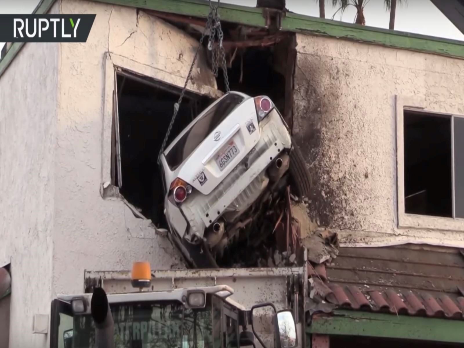 Watch This Driver Crash Into The Second Floor Of A Building