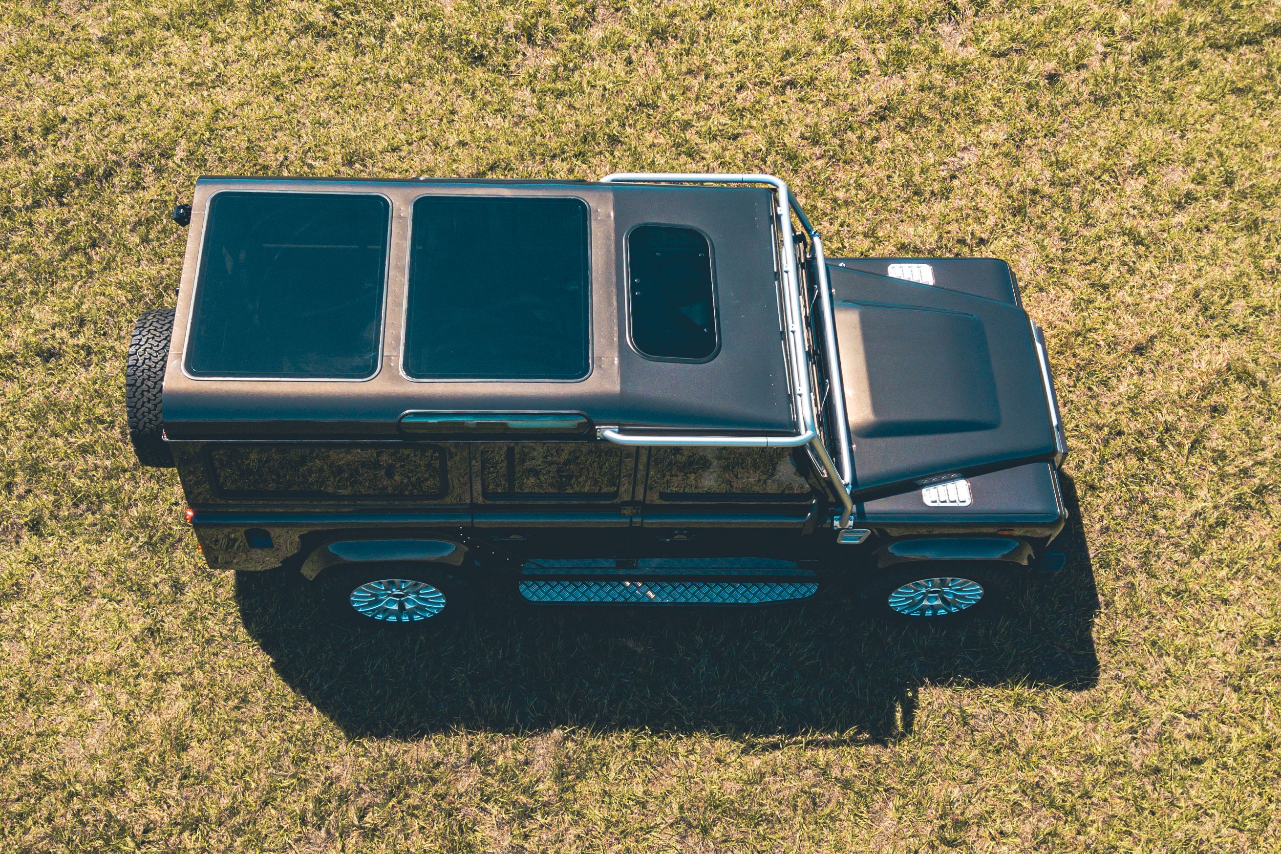 Custom Defender Packs Big V8 And Even Bigger Glass Roof
