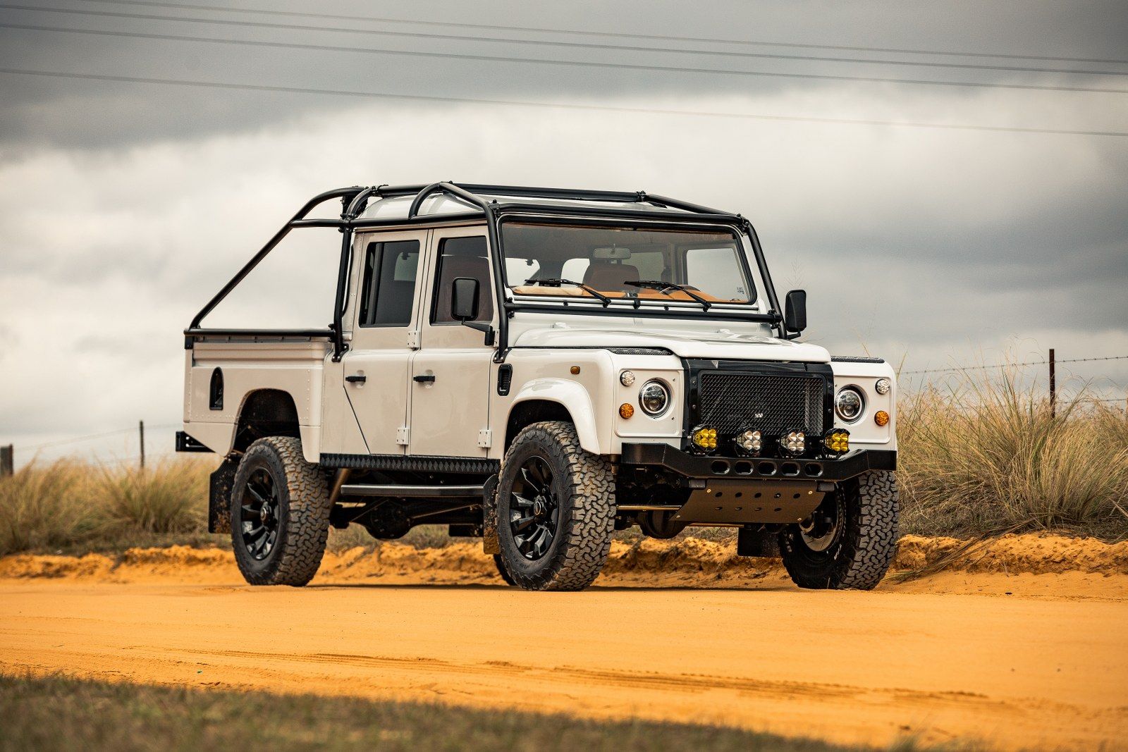 Land Rover Defender Restomod Boasts Cowhide, Sheepskin And Lots Of Wood