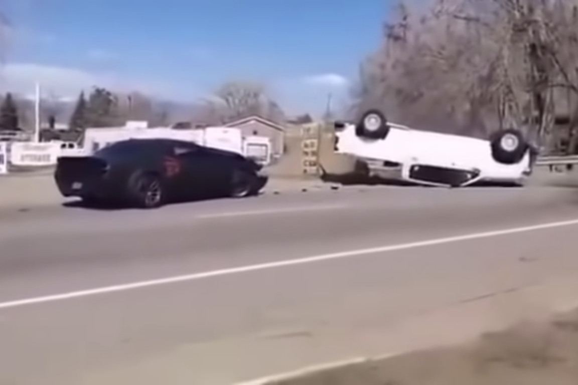 Watch A Dodge Challenger Hellcat Flip Over A Chevy Silverado
