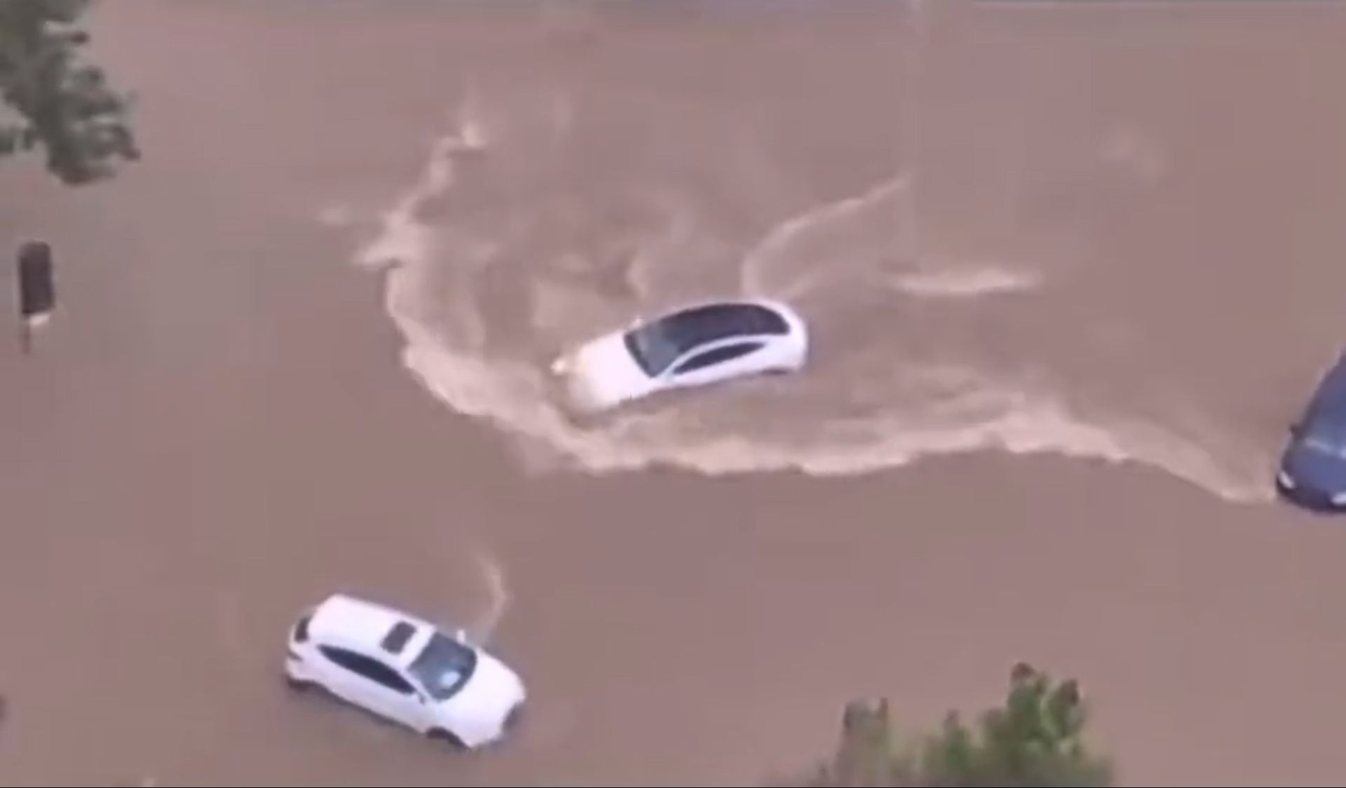 Don't Try This At Home: Tesla Model 3 Wades Through Deep Flood Water