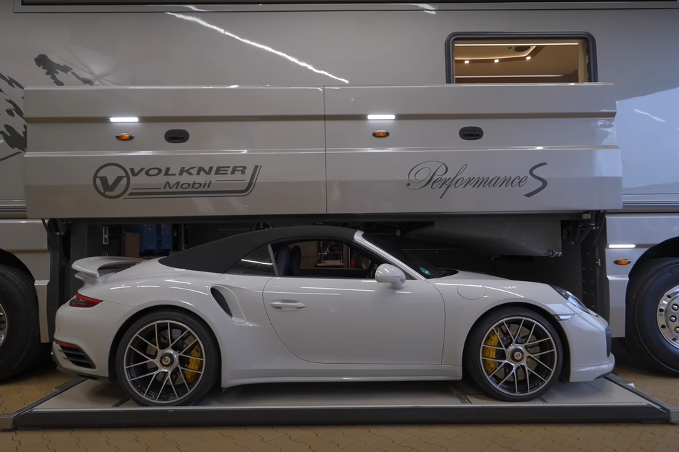 This $1.8 Million Motorhome Has Space To Haul A Porsche 911