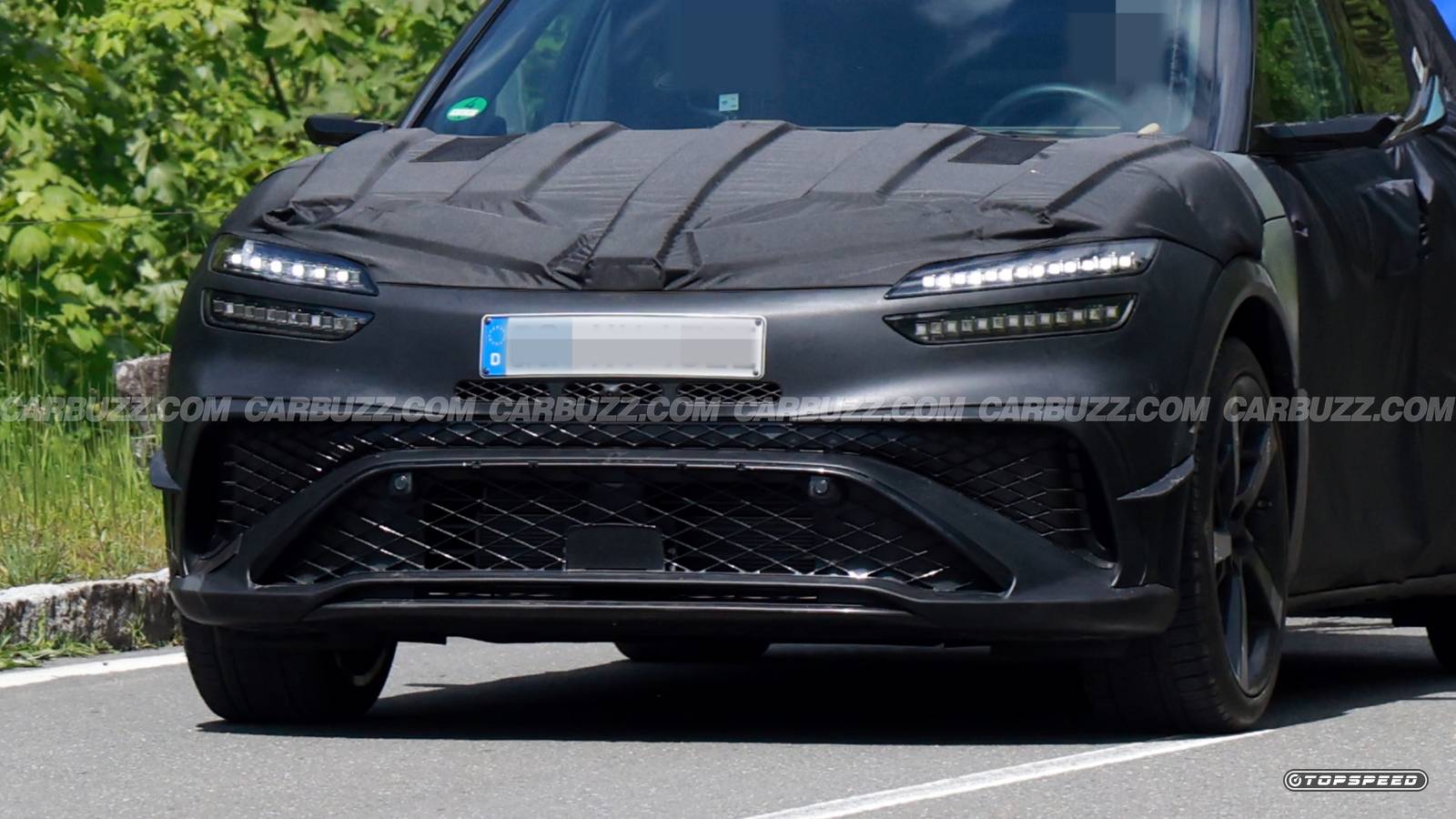 Hot New Genesis GV60 Magma Spotted Partially Uncovered